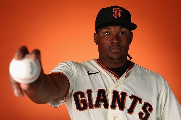 Red Sox sign former Giants pitching prospect Melvin Adón to minor ...